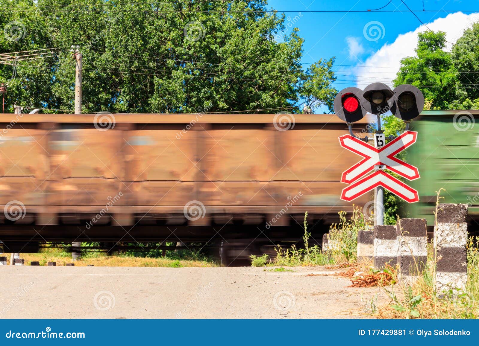 Red Signal of Semaphore and Stop Sign in Front of Railroad Crossing ...