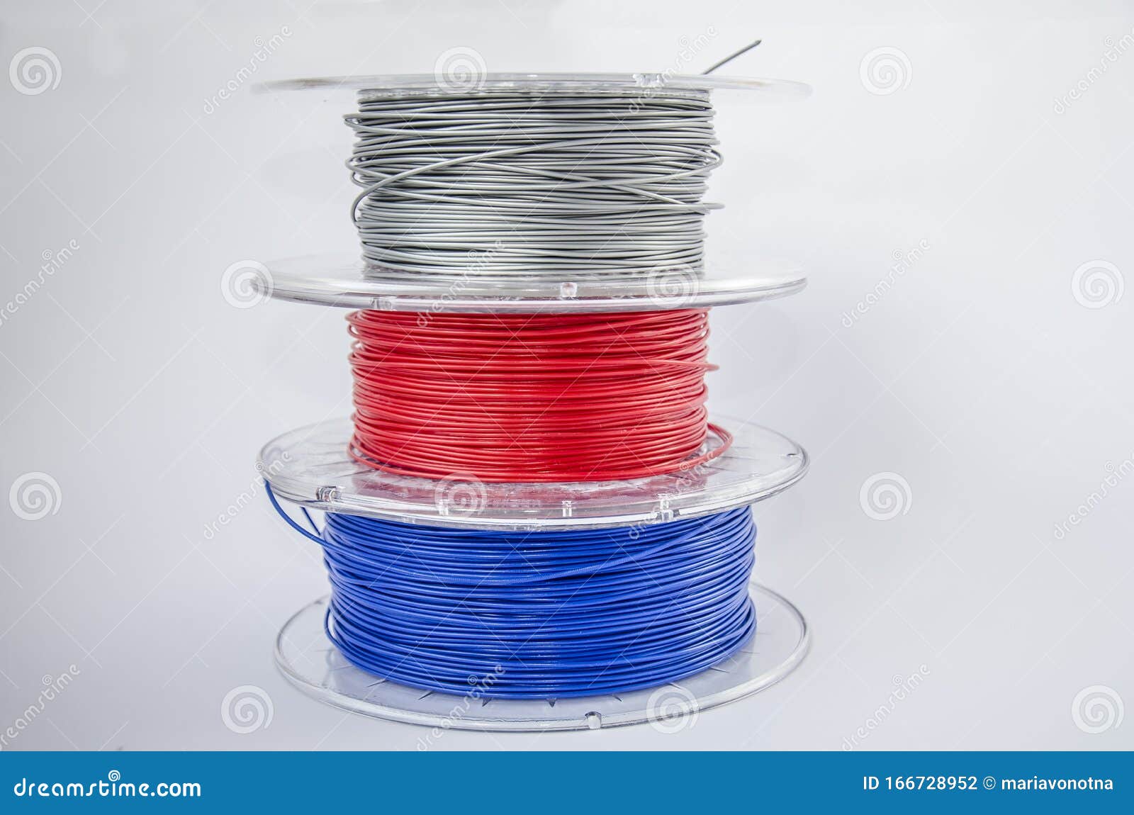 Red, Silver and Blue Plastic Filament Coils for 3d Stock Photo - Image ...