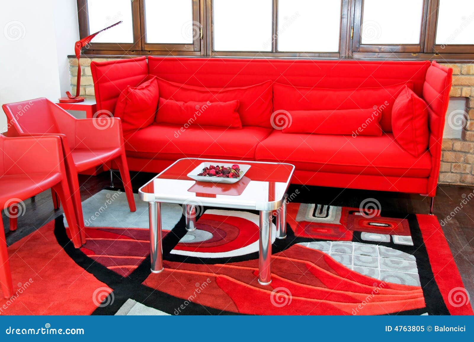 Red sitting area stock image. Image of room, cushion, living - 4763805