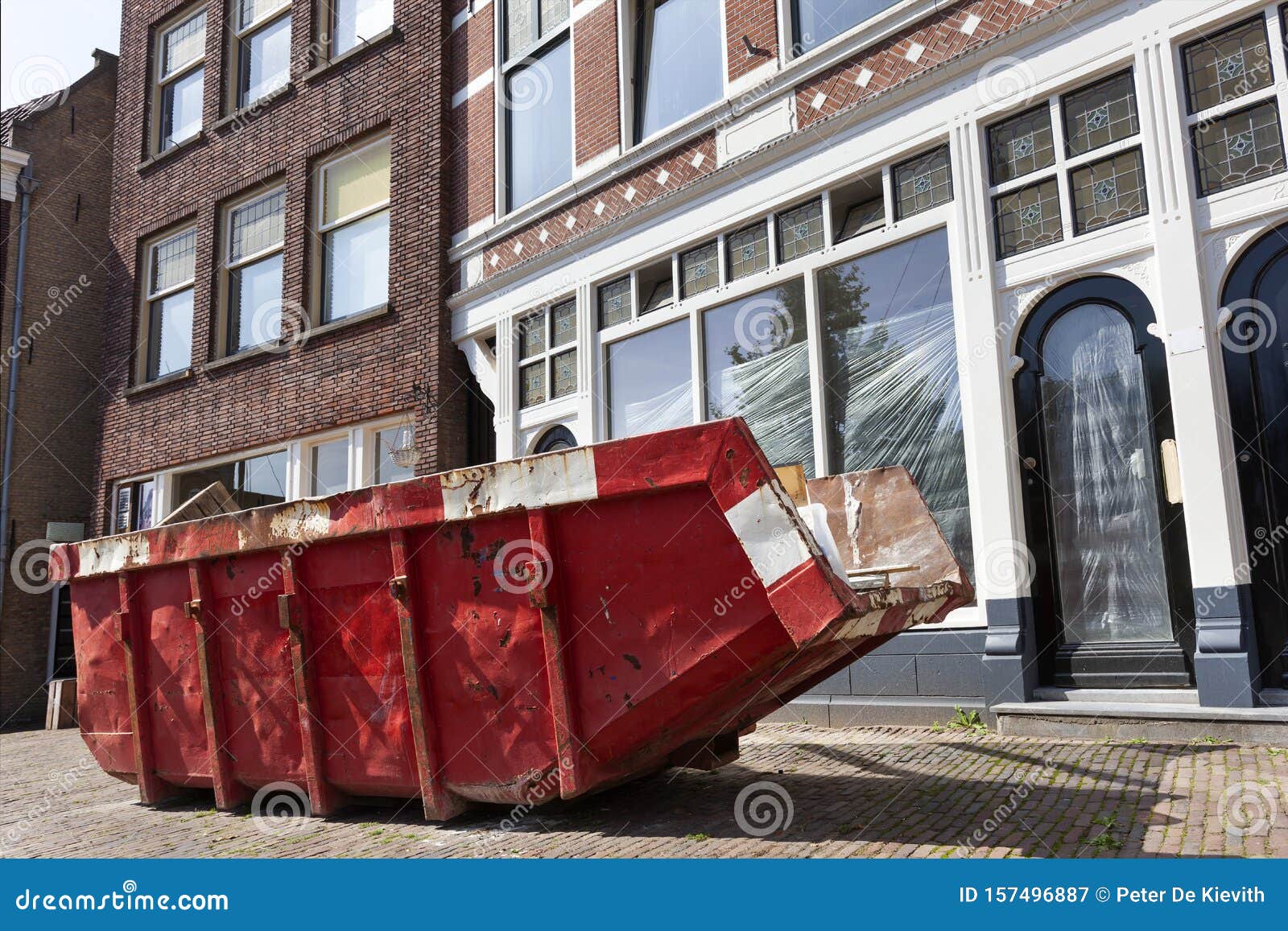 Red Skip in a Street in Rotterdam Stock Image - Image of waste ...