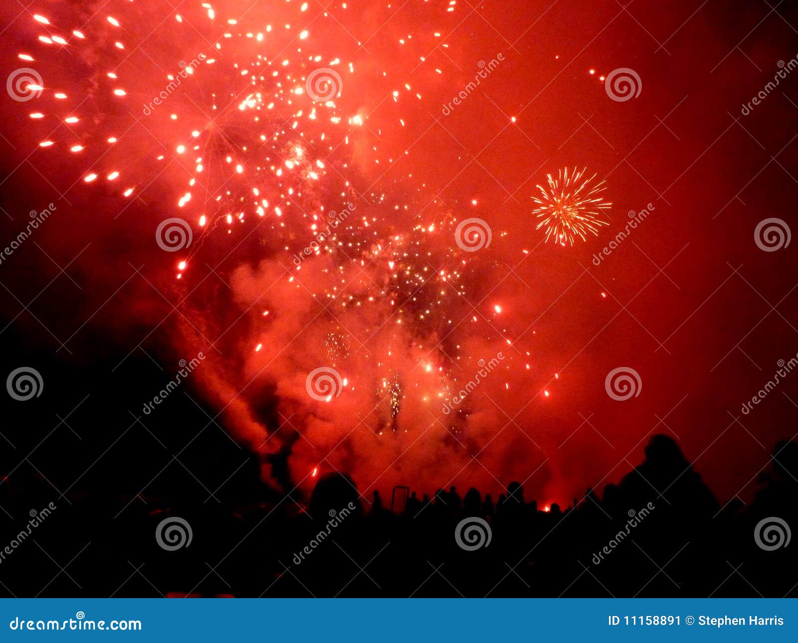Red sky fireworks 2 stock image. Image of flash, crowd - 11158891