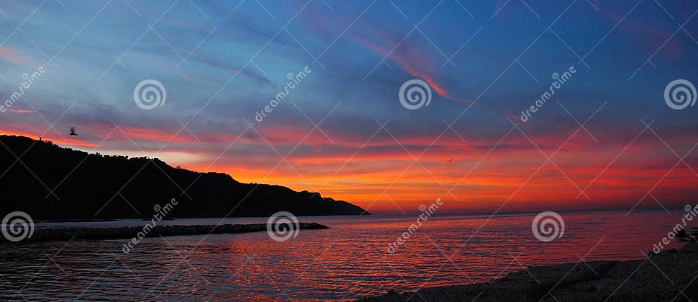 Red sky in sunset - Italy stock photo. Image of love, sail - 1560310