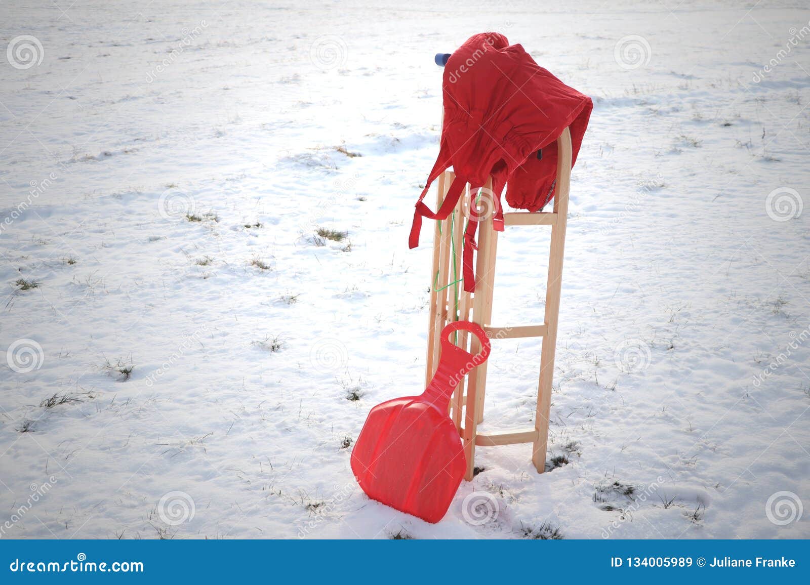 Red Sledge and Warm Trousers in Snow Landscape Stock Image - Image of ...