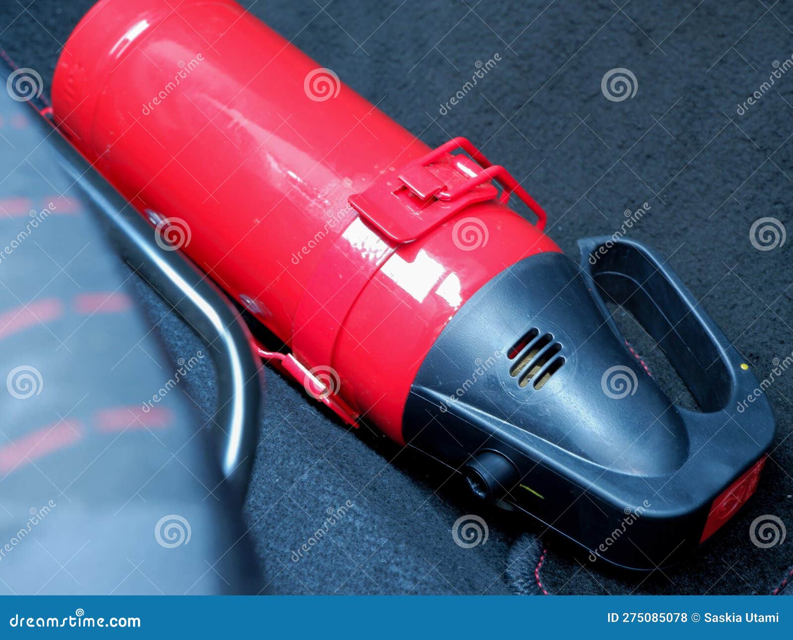 Red Small Fire Extinguisher in the Car for Safety and Prevent Fire ...
