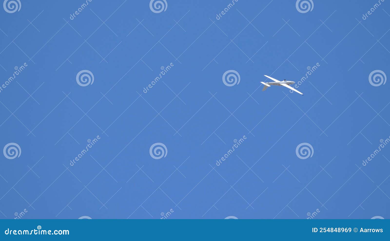 Red Small Sport Plane Flying in the Sky Pulls on a Rope the Glider ...