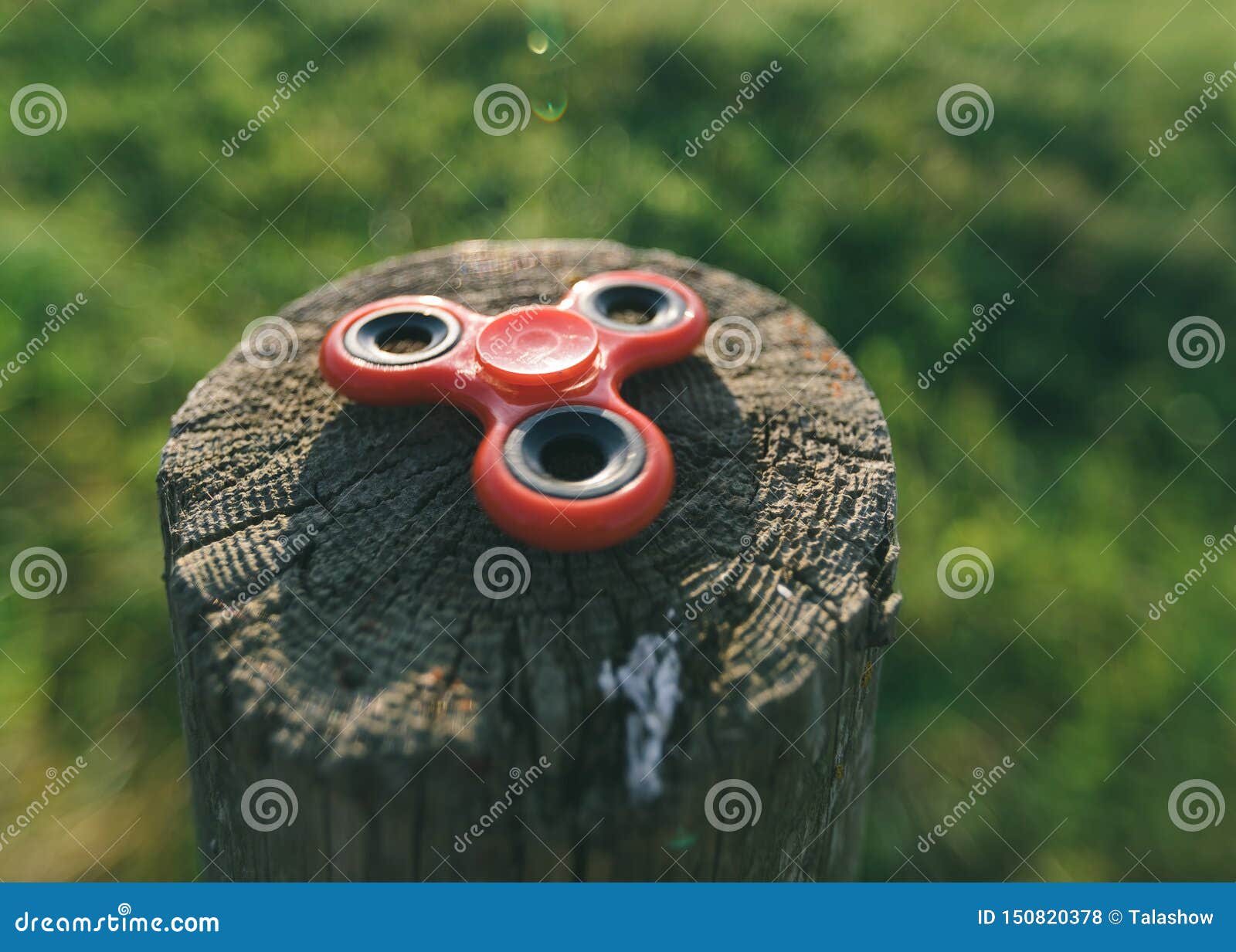 Red spinner on a close-up stock photo. Image of detail - 150820378