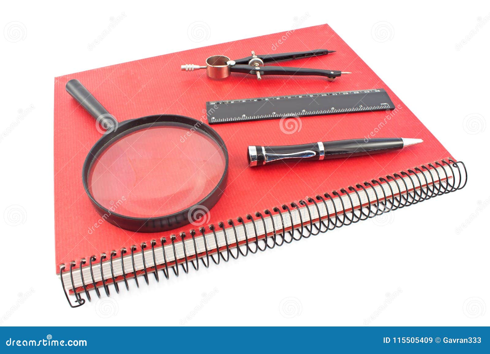 Red Spiral Notebook with Drawing Compass, Ruler and Magnifier is Stock ...