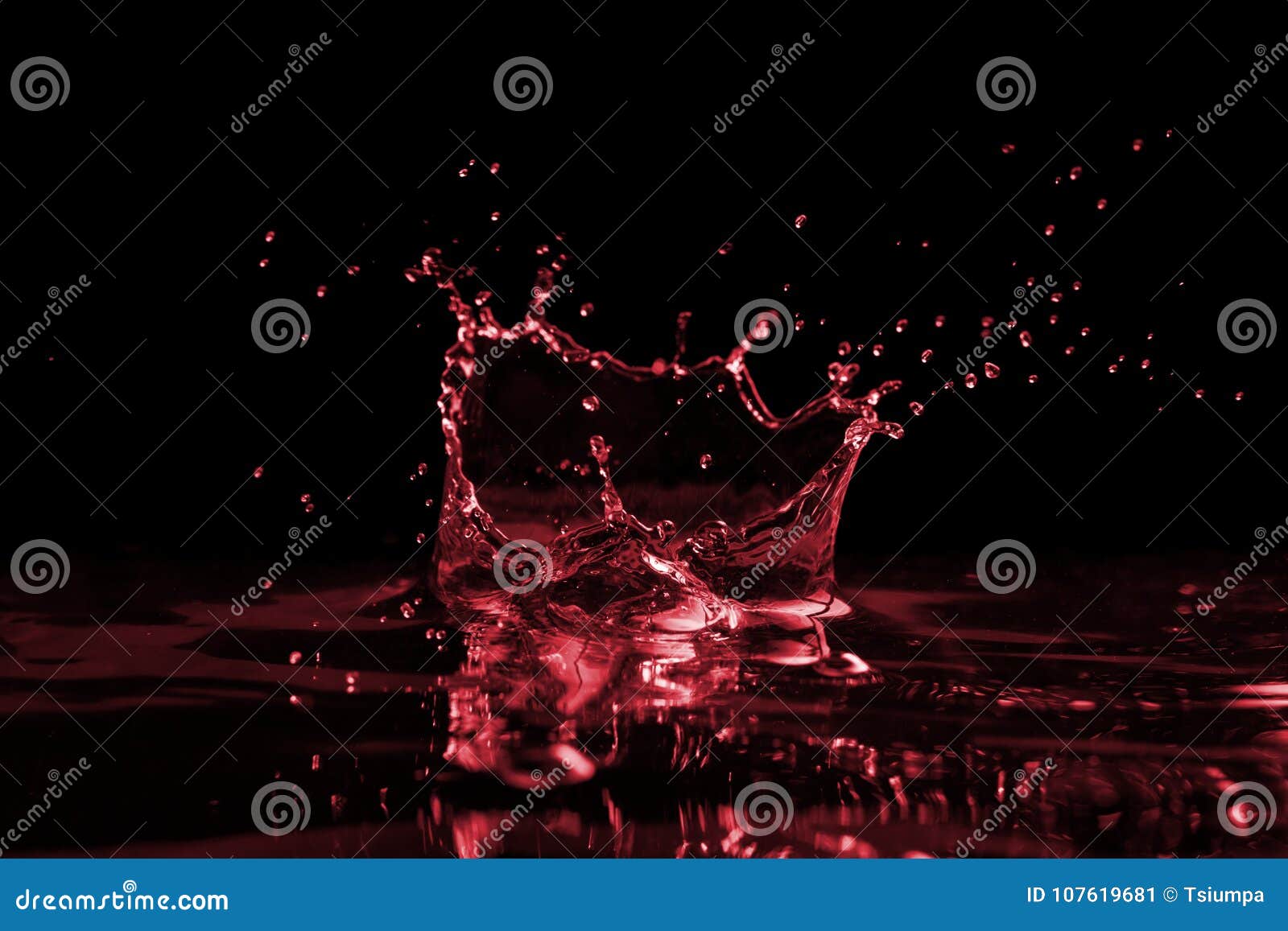 Red splash on a black stock image. Image of flowing - 107619681