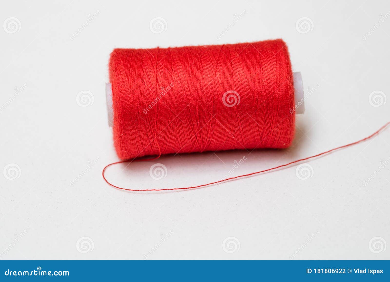 Red Spool of Sewing Thread Isolated, Close Up Stock Photo - Image of ...