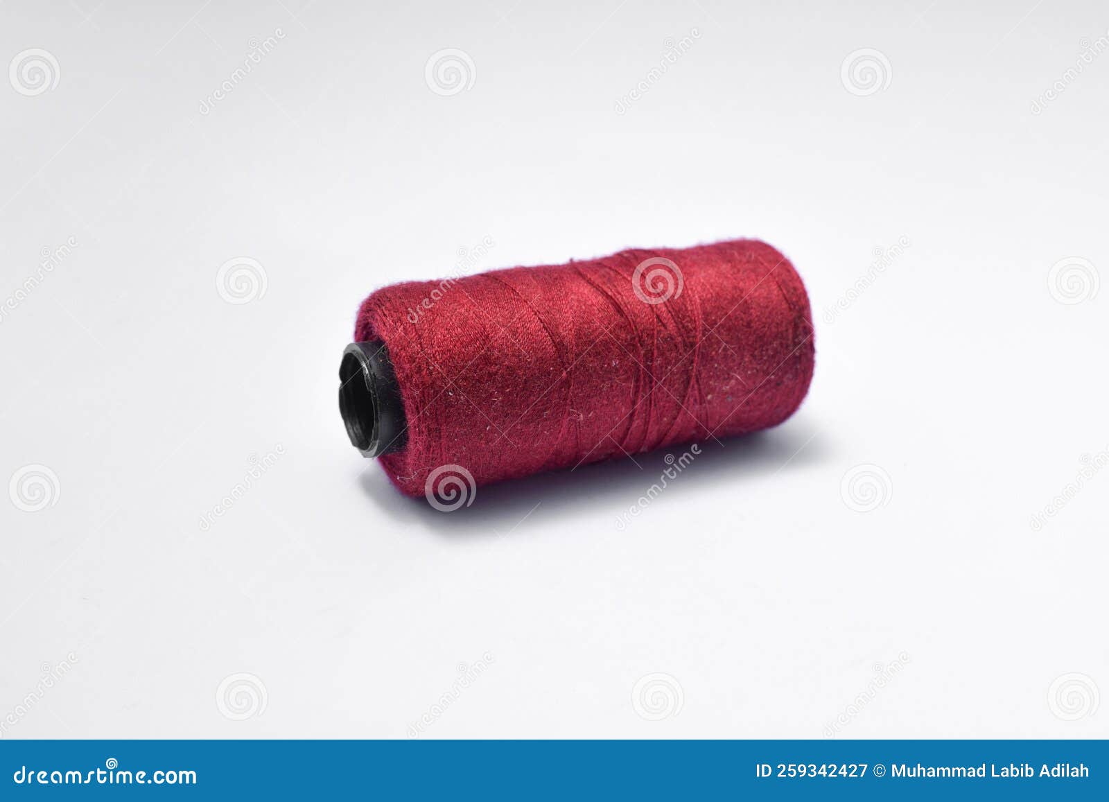 Red spool of thread stock image. Image of hobby, colours - 259342427