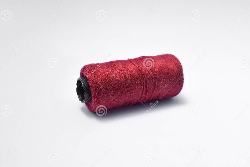 Red spool of thread stock image. Image of hobby, colours - 259342427
