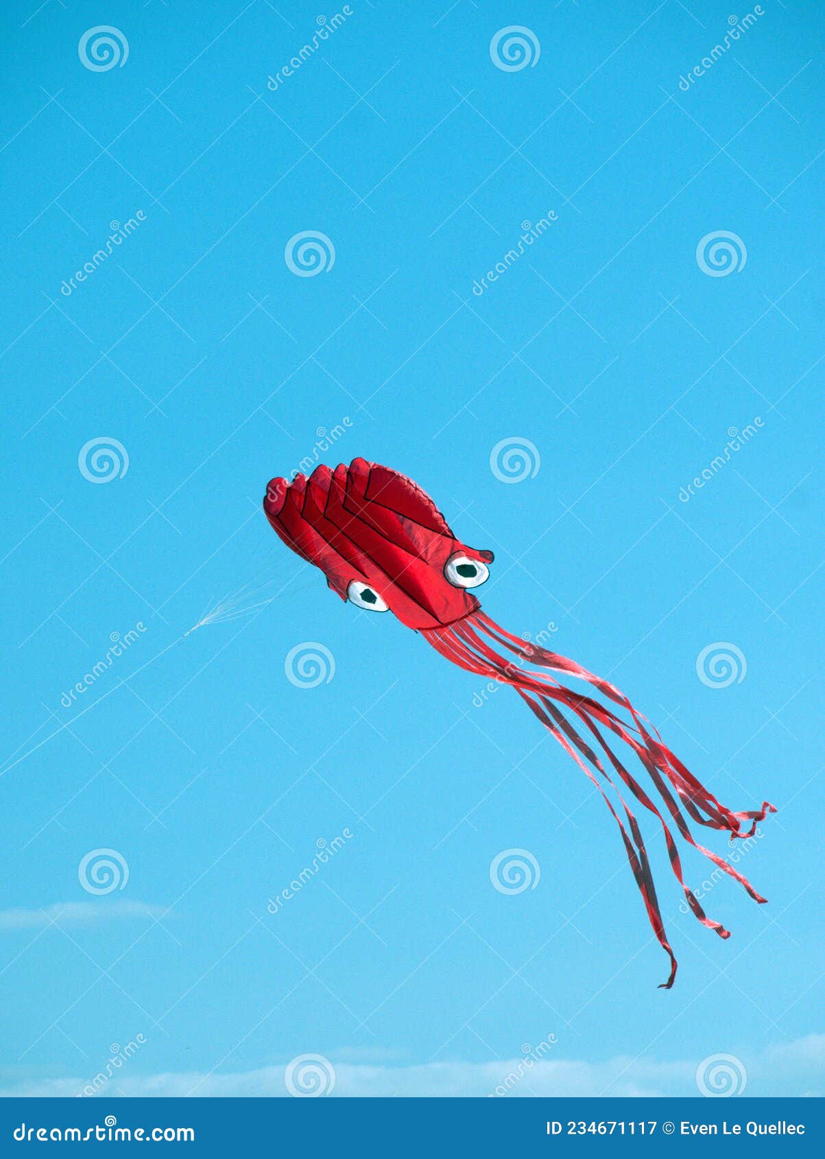 Red Squid Kite Floating in Clear Sunny Sky Stock Image - Image of ...