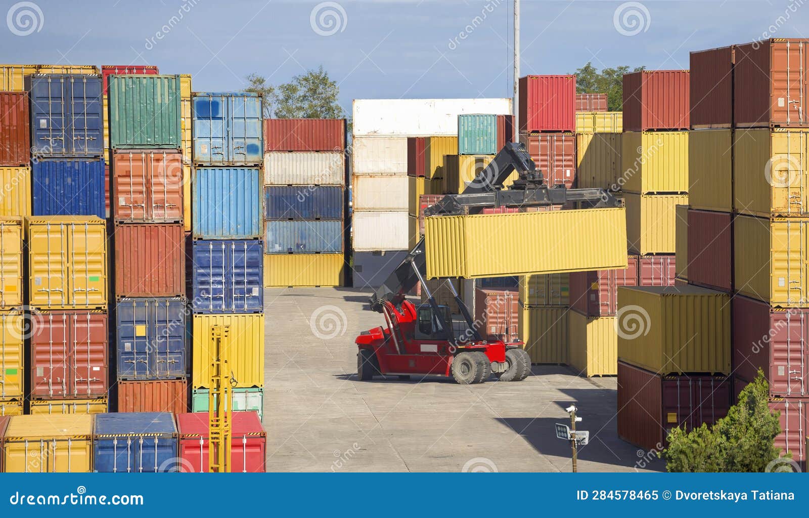 The Red Stacker Stacks Shipping Containers at the Port Warehouse ...