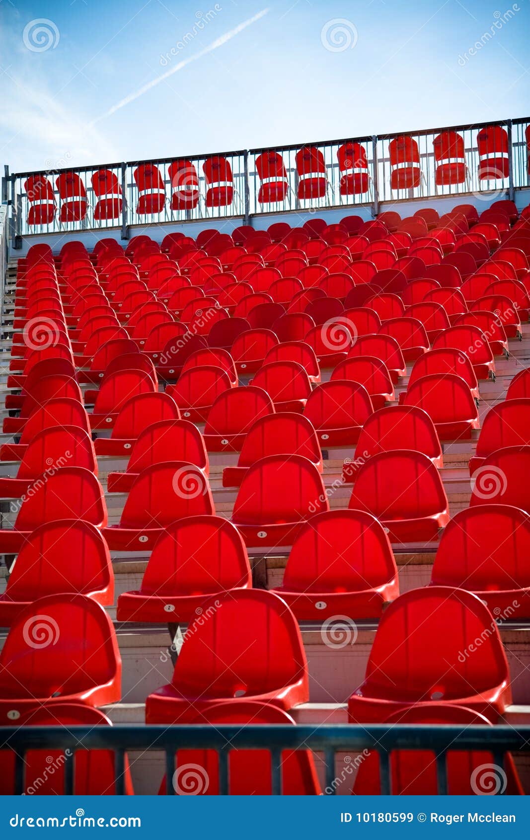 Red stadium seats stock image. Image of column, rows - 10180599