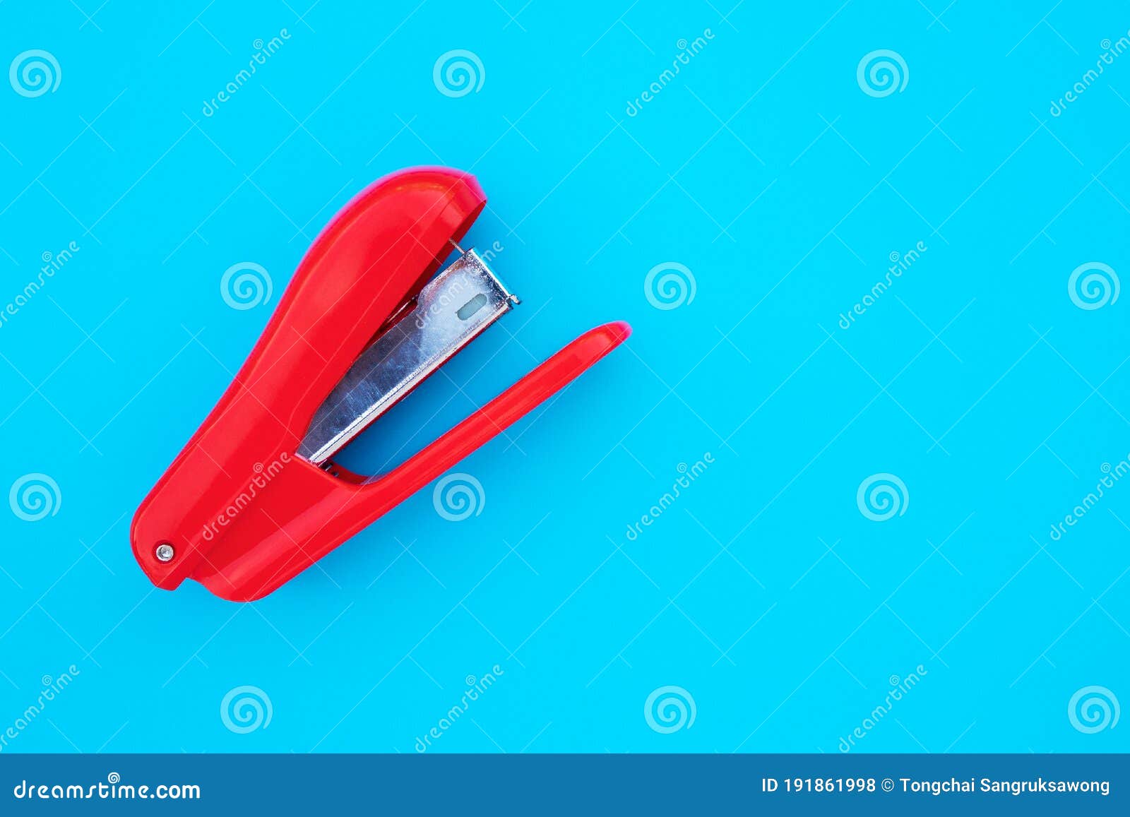 Red Stapler.Red Stapler On A Blue Background Royalty-Free Stock Image ...