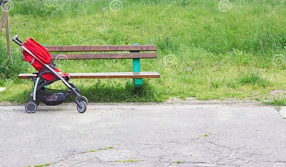 Red stoller in the park stock image. Image of child, happiness - 72166977