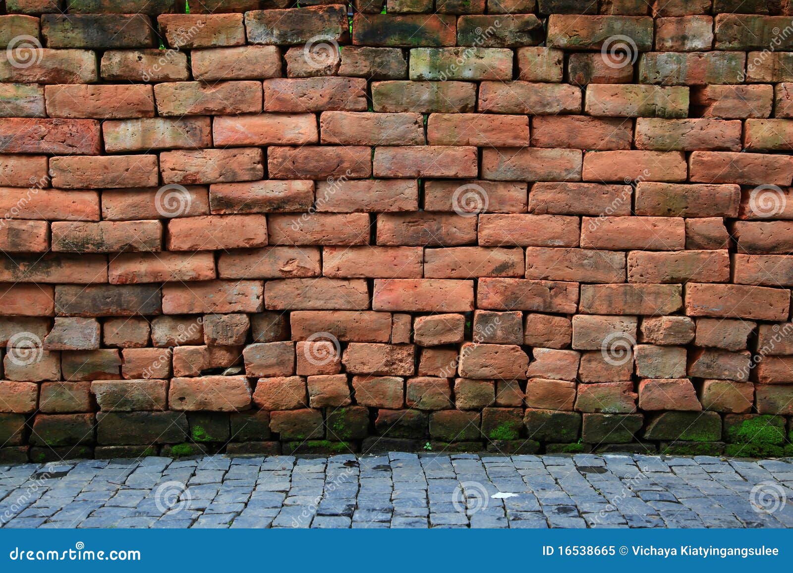 Red Stone Brick Wall with Pavement Stock Image - Image of paved ...