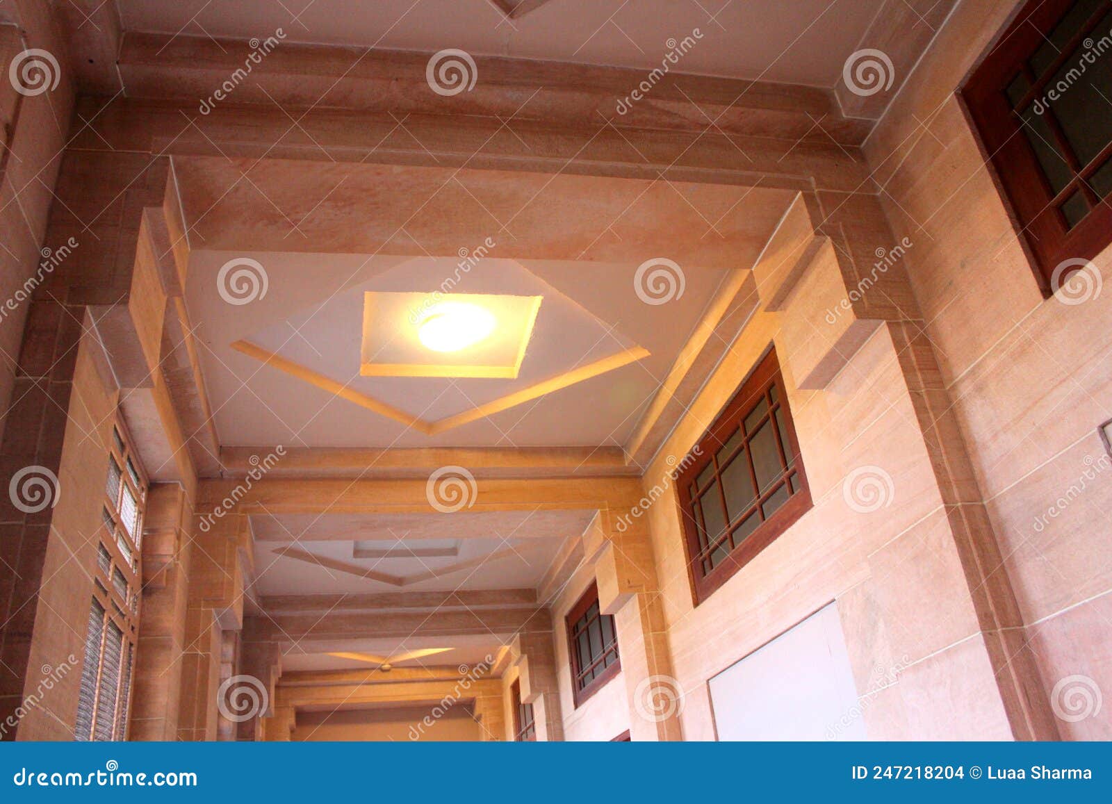 Red Stone Building with Geometric Design Ceiling Stock Photo - Image of ...