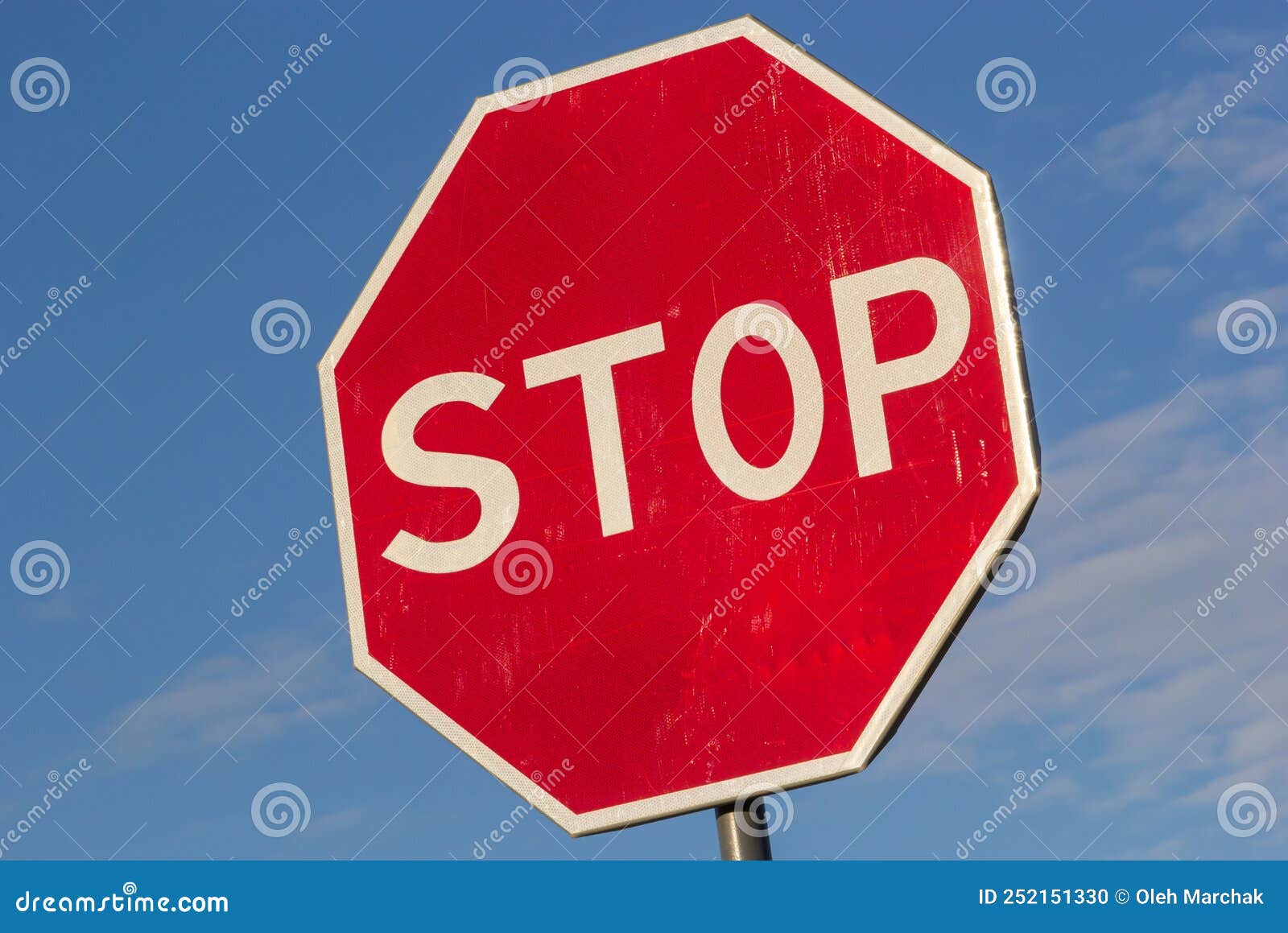Red Stop Sign with Blue Sky and Clouds Background Stock Photo - Image ...