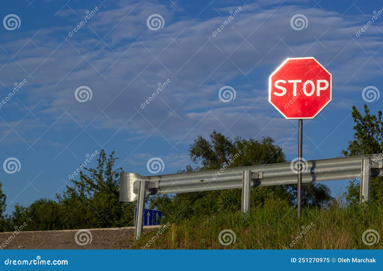 Red Stop Sign with Blue Sky and Clouds Background of the Road Stock ...