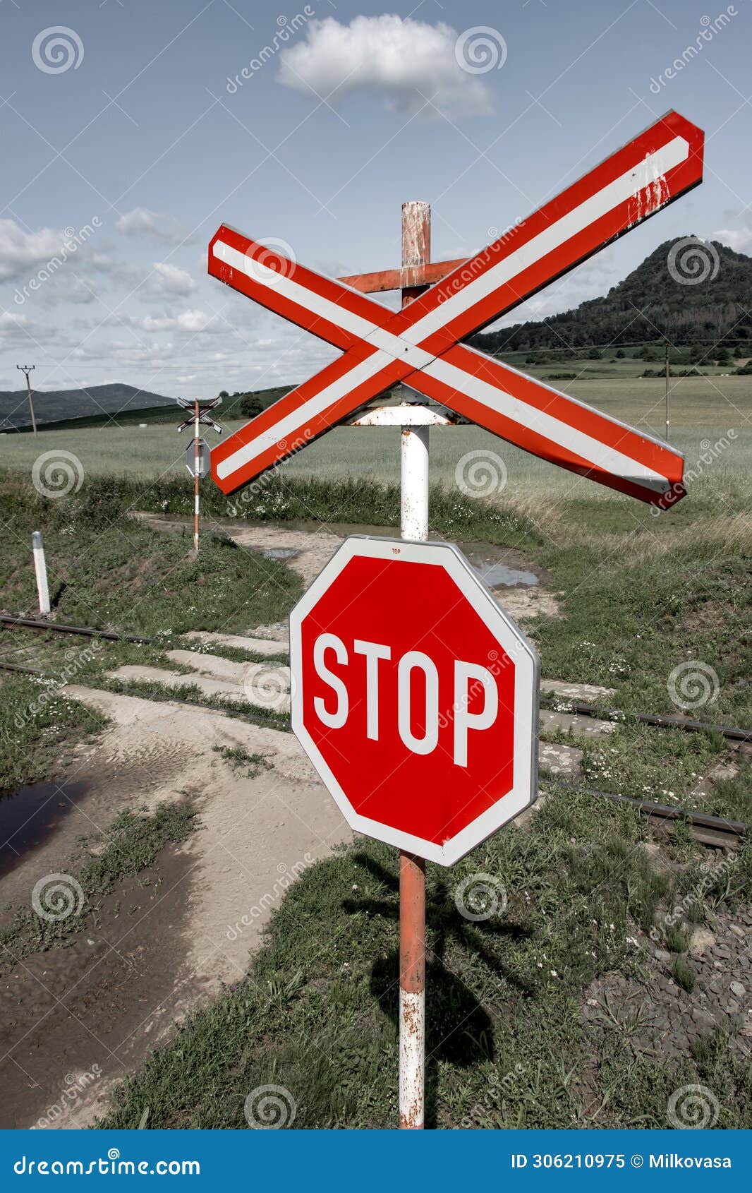 A Red STOP Sign before Crossing the Tracks Stock Image - Image of road ...