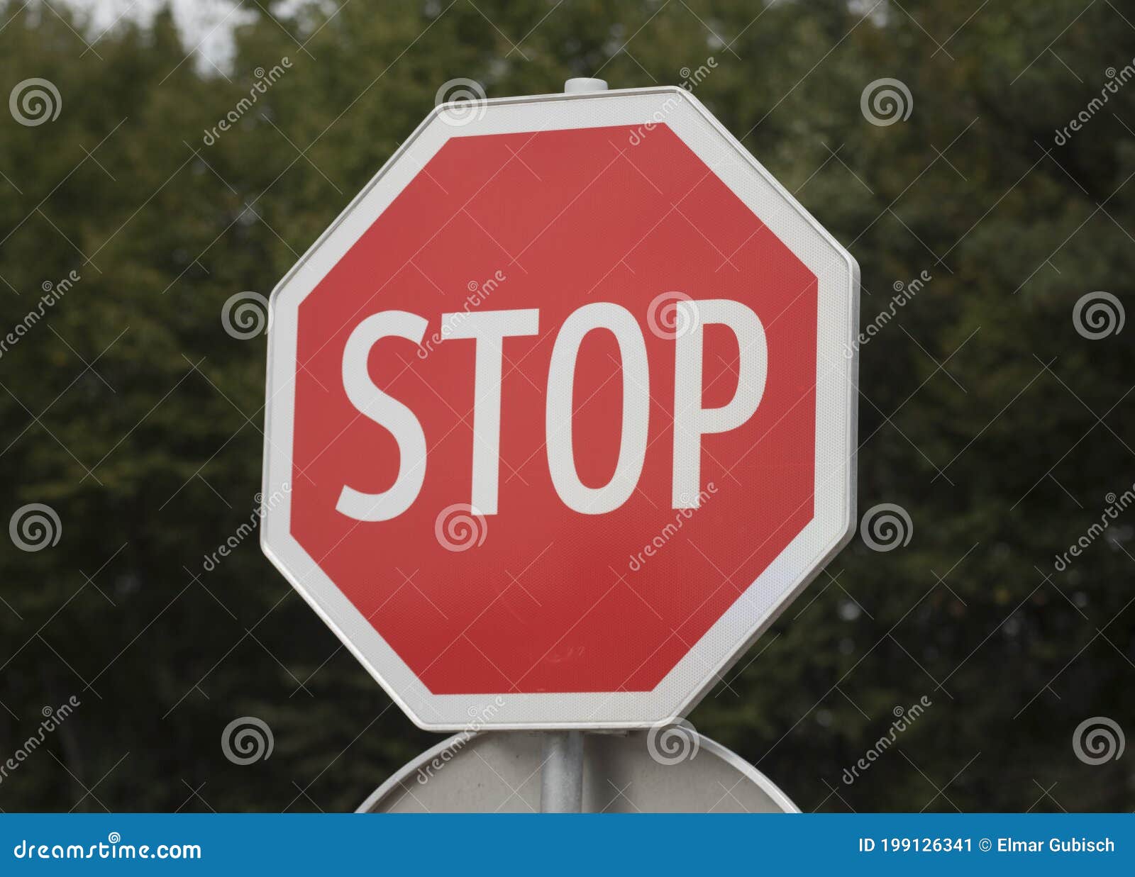 Red stop sign in traffic stock image. Image of management - 199126341