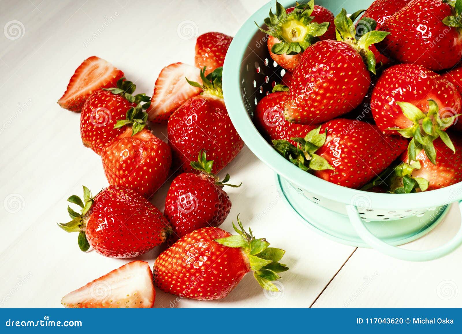 Red Strawberries in Colander on a White Wooden Table Stock Photo ...