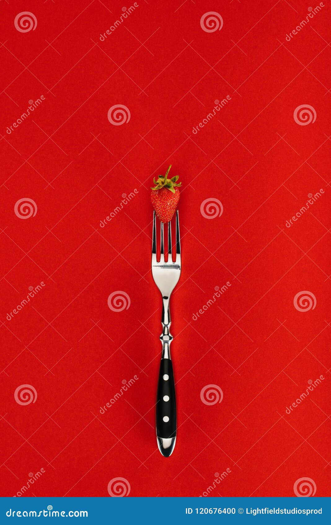 Red strawberry on a fork stock photo. Image of summertime - 120676400