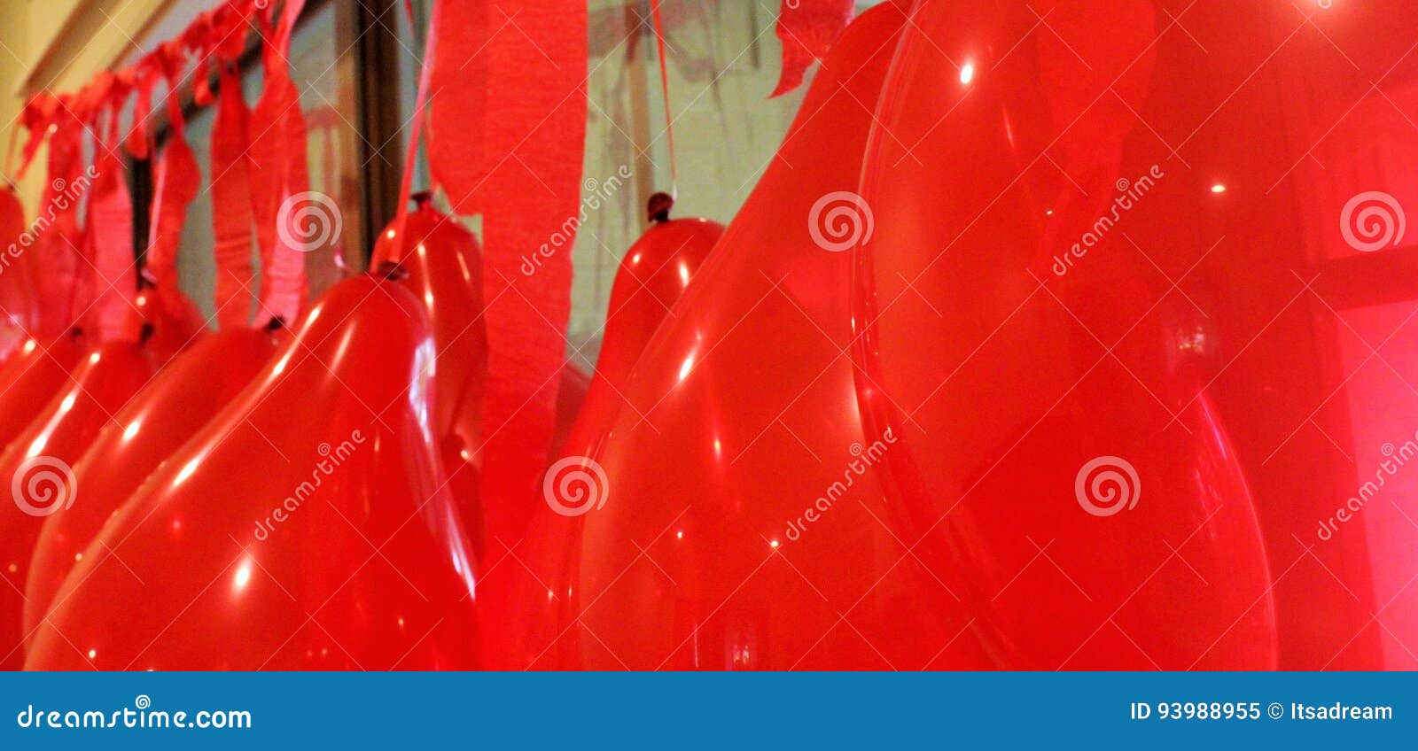 Red streamer and balloon stock image. Image of detail - 93988955