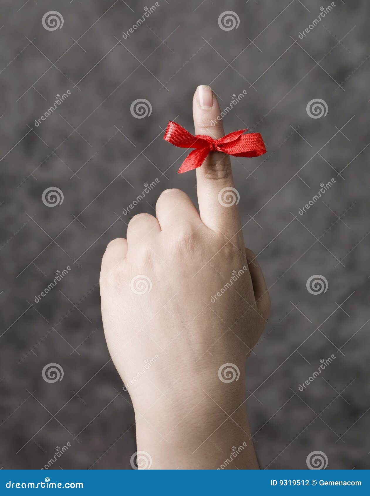 Red string around a finger stock photo. Image of grey - 9319512