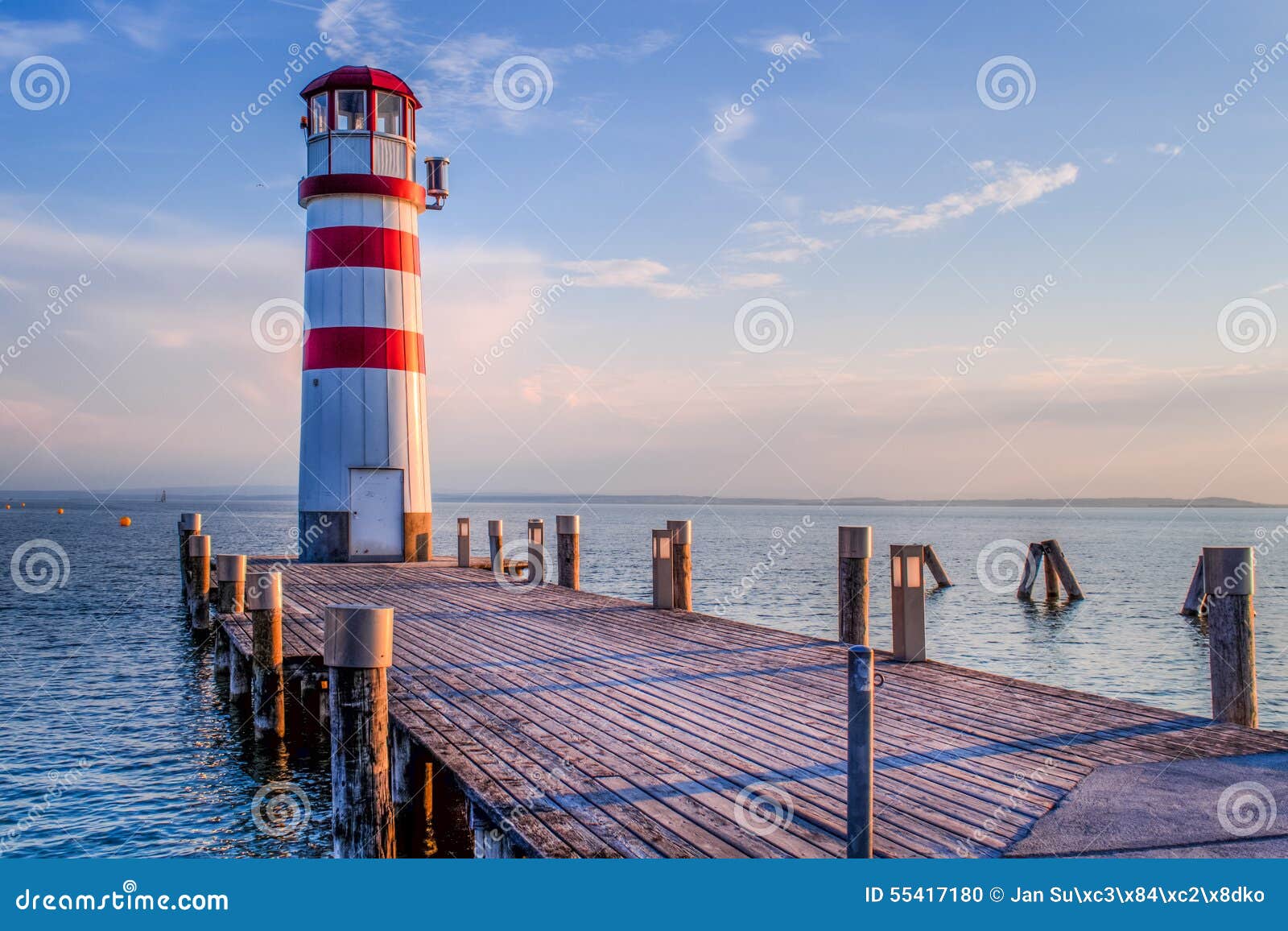 Red striped lighthouse stock photo. Image of podersdorf - 55417180