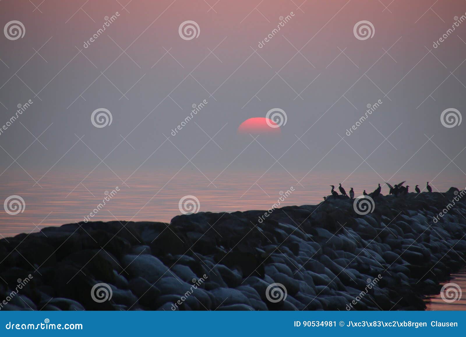 Red Sun and Birds by Stone Pier Stock Image - Image of black, reddish ...