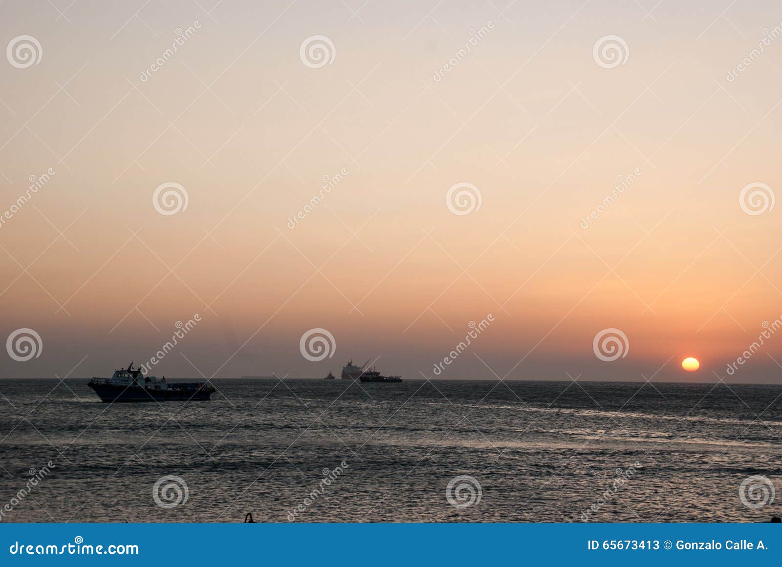 Red sun and sea at sunset stock image. Image of sunshine - 65673413
