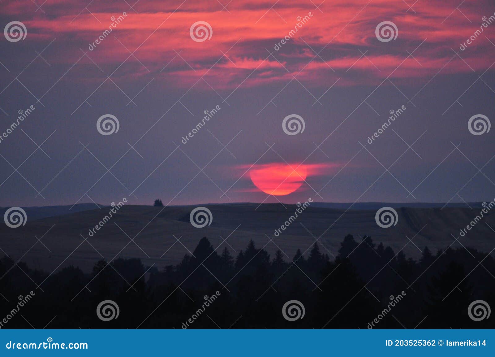 Red Sun Setting Below Clouds, Over Fields Stock Photo - Image of colors ...