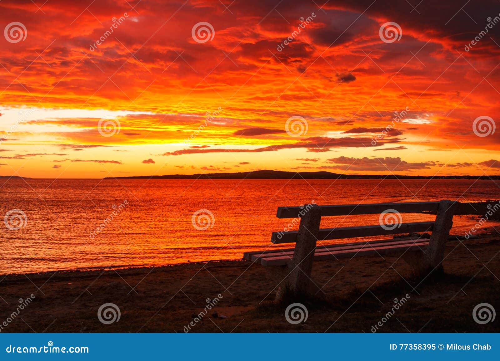 Red sunset stock image. Image of coast, silhouette, light - 77358395