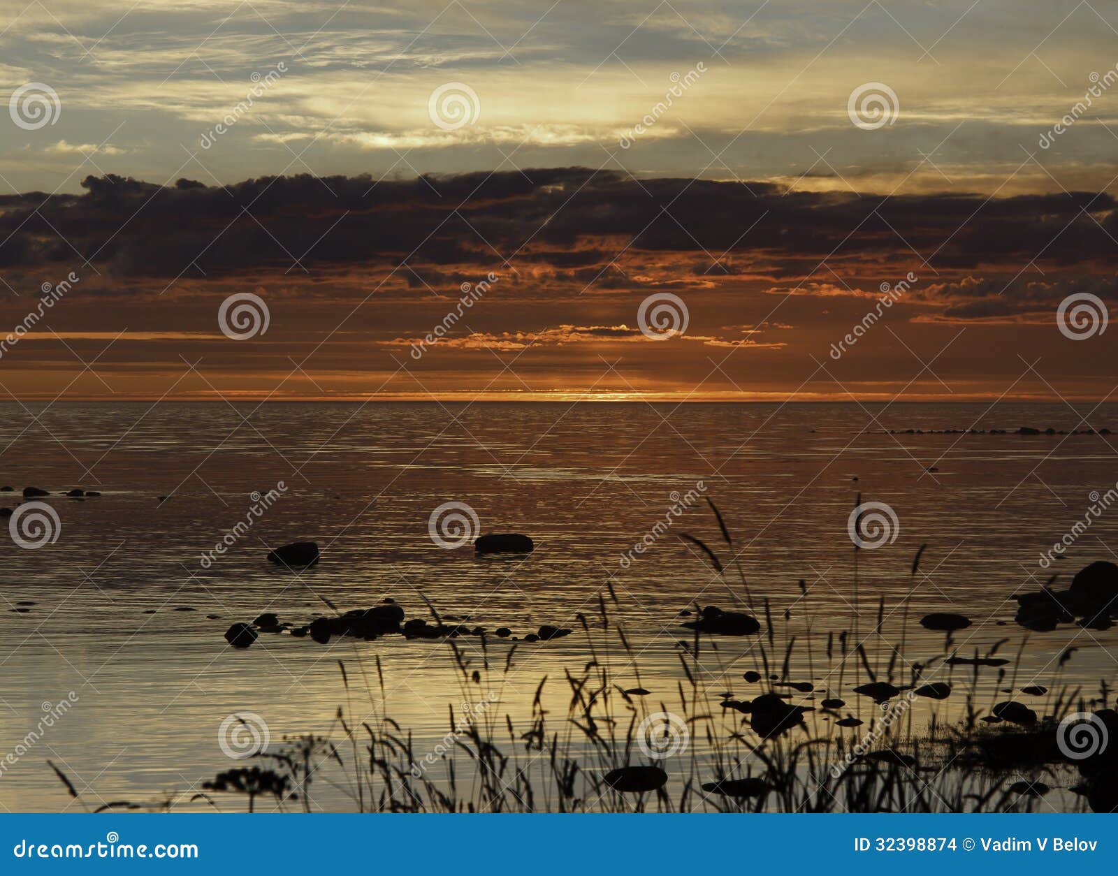 Red sunset stock photo. Image of ocean, black, tone, ripples - 32398874
