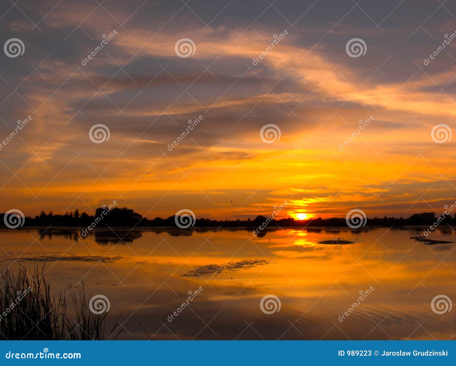 Red sunset by the lake stock image. Image of beautiful - 989223
