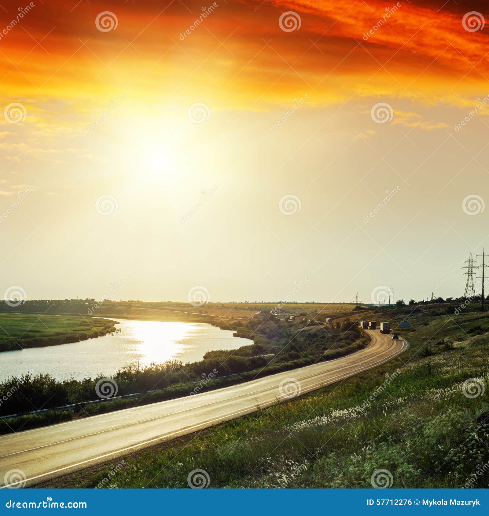 Red Sunset Over Asphalt Road Near River Stock Photo - Image of grass ...
