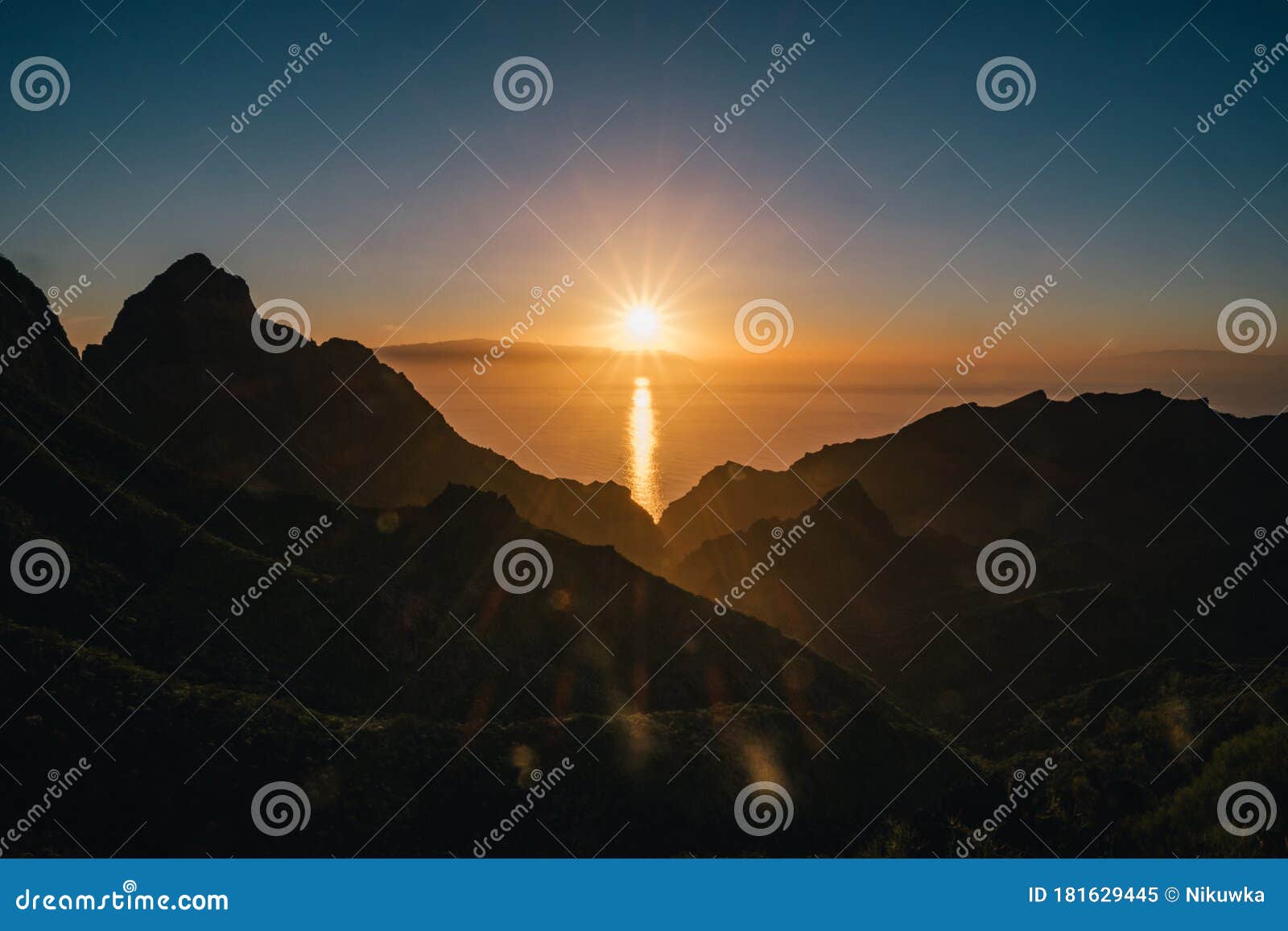 Red Sunset Over Mountains and Ocean Stock Image - Image of island ...