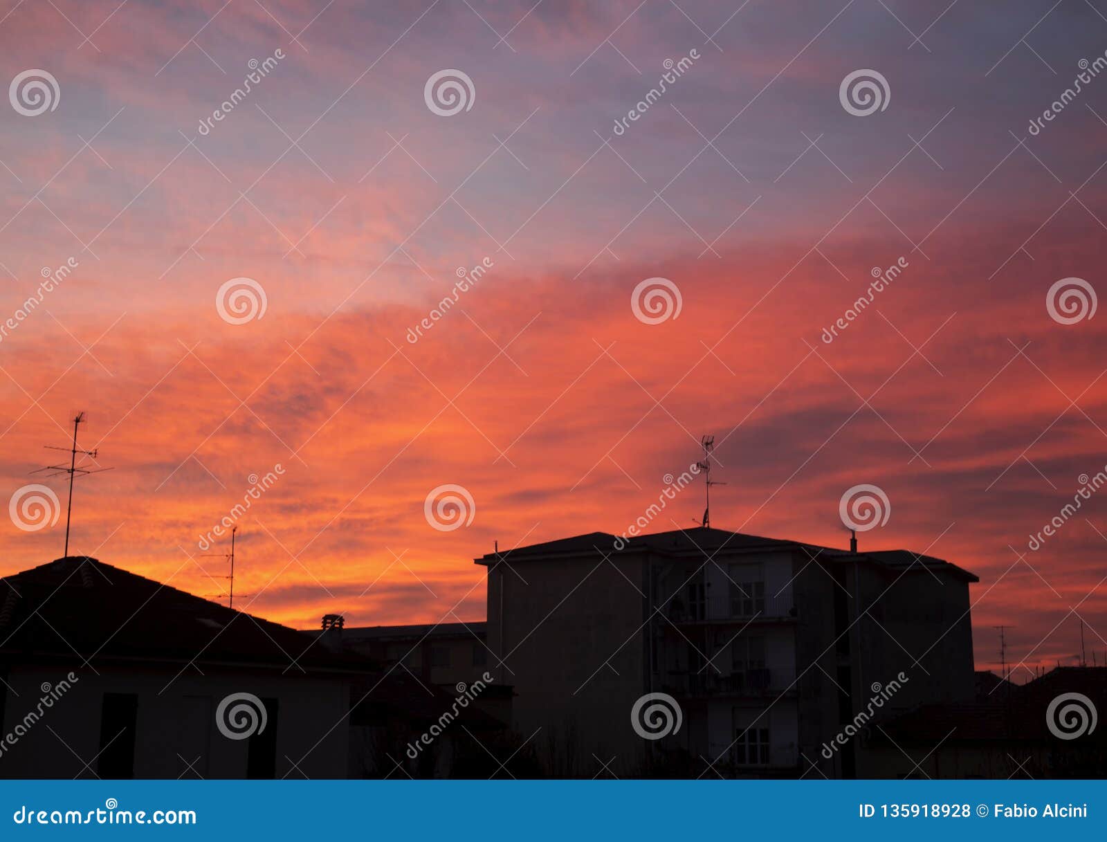 Red sunset over the town stock photo. Image of evening - 135918928