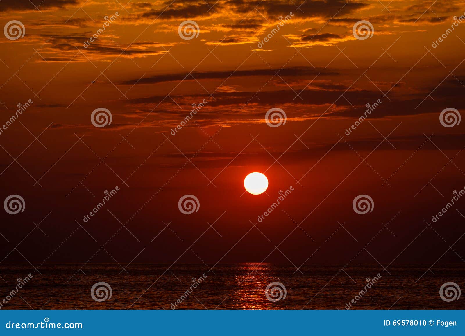 Red sunset over water stock photo. Image of ocean, color - 69578010