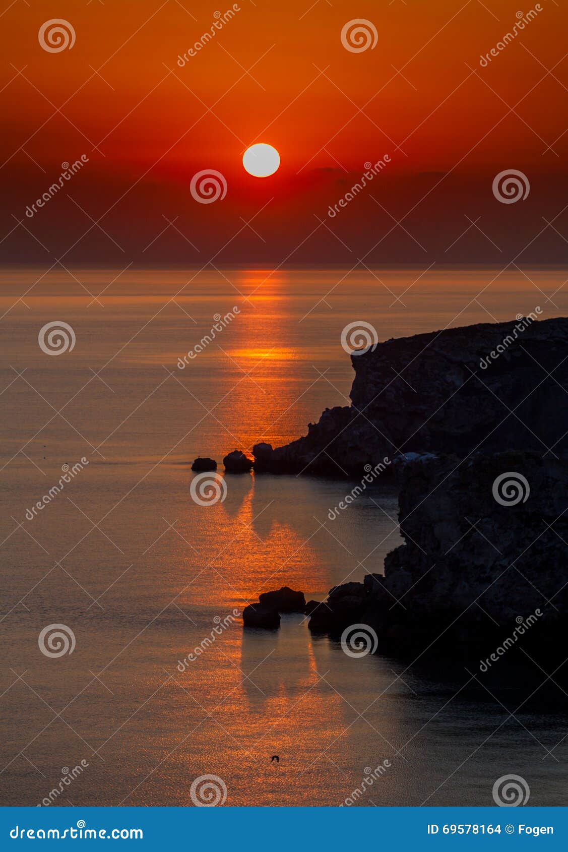 Red sunset over water stock photo. Image of mountain - 69578164