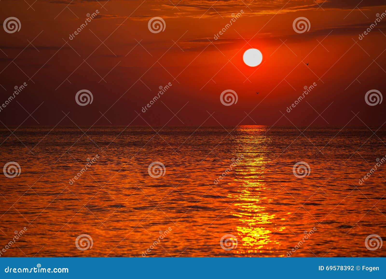 Red sunset over water stock photo. Image of horizon, beauty - 69578392