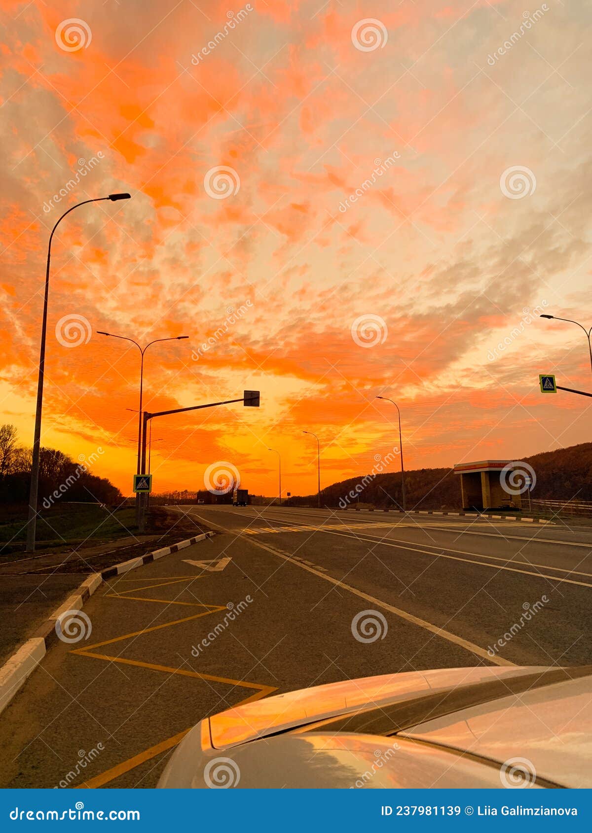 Red sunset on a road stock image. Image of shining, travel - 237981139