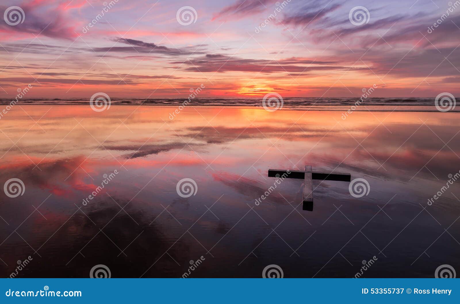 Red Sunset Wet Beach Cross stock image. Image of sunset - 53355737