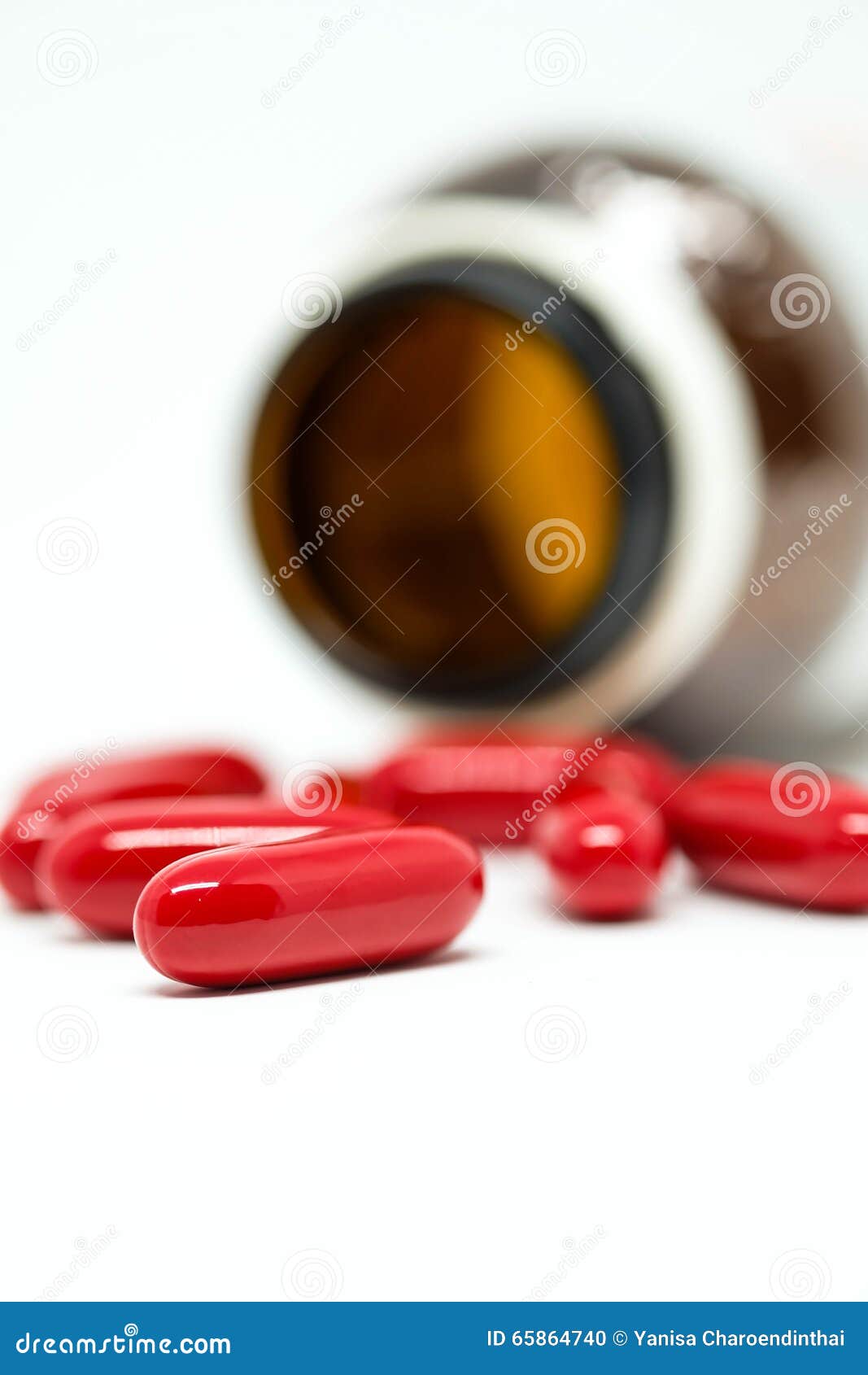 Red Supplement Tablets and the Bottle Stock Photo - Image of health ...