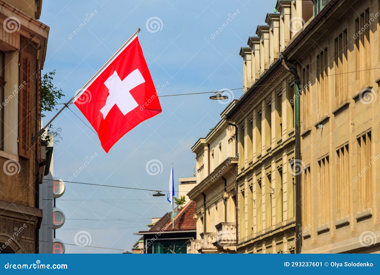 Red Swiss Flag Hanging from Building Facade Stock Image - Image of ...