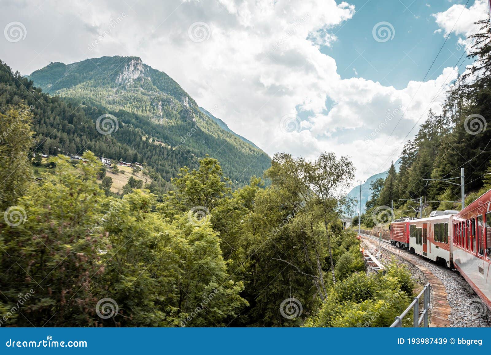 Red Swiss Train in Switzerland Mountains. an Amusing Trip. Stock Image ...