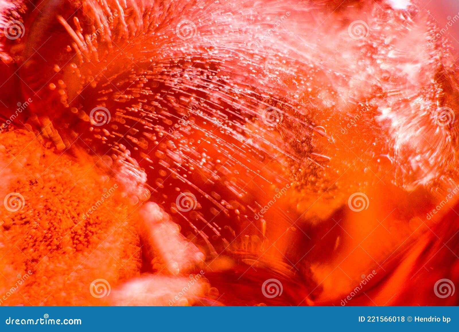 Red Syrup with Oxygen Sparkle Ice Cubes in Glass Close Up Stock Photo ...