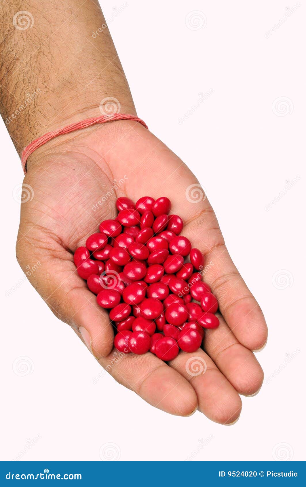 Red tablets on hand stock photo. Image of healthcare, medicine - 9524020
